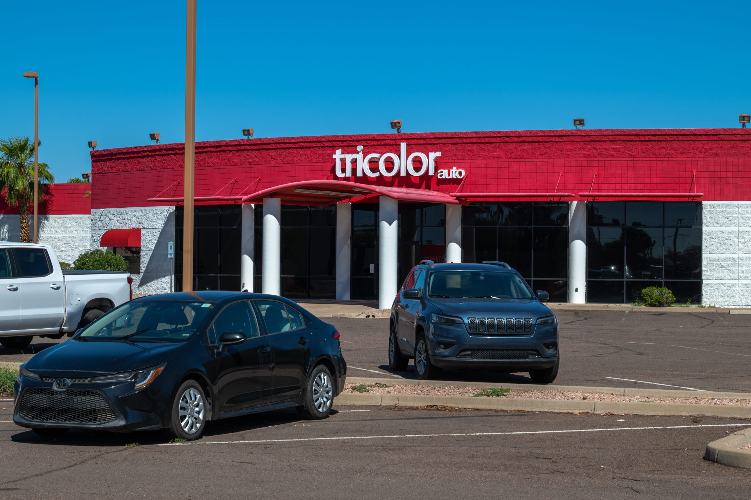 Car auction firm reports nearly $19M Tricolor-linked loss - Auto ...